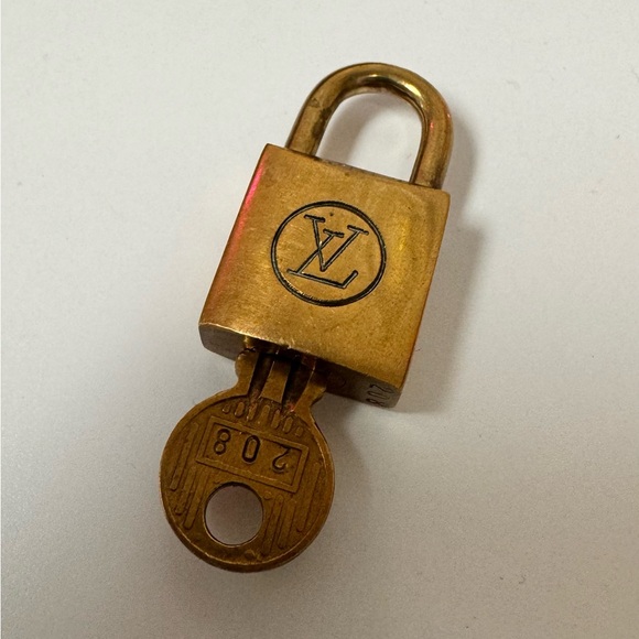Louis Vuitton | Accessories | Authentic Lv Lock And Key | Poshmark